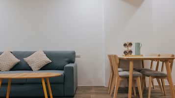 Quarto quádruplo luxo, para não fumantes | Área de estar