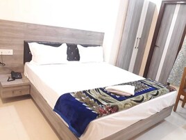 Quarto luxo | 1 quarto, Wi-Fi de cortesia