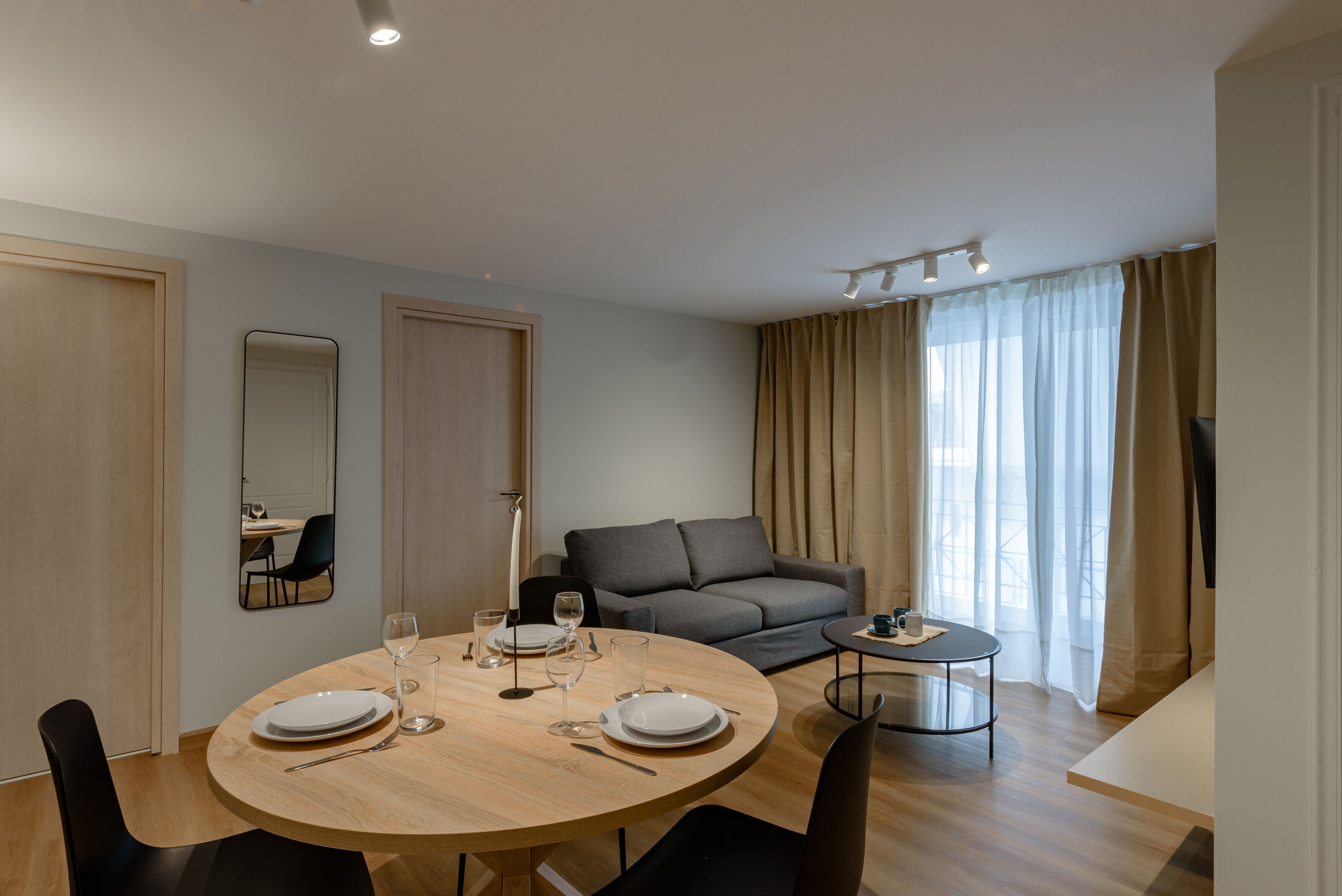 Apartamento luxo | Área de estar | TV LED 40 polegadas com canais a cabo