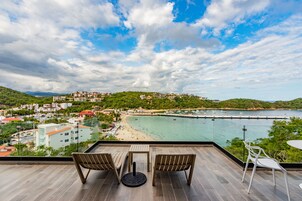 Junior Plus | Vista para a praia ou o mar