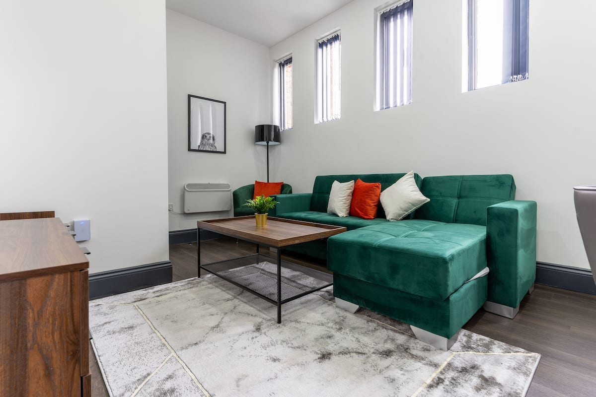 Apartamento | Sala de estar | TV de ecrã plano