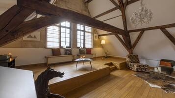 Apartamento premium | Área de estar | Lareira