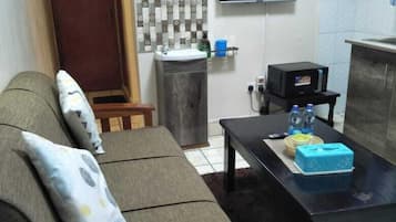 Apartamento Familiar | Sala de estar | Smart TV de 24 polegadas com canais digitais