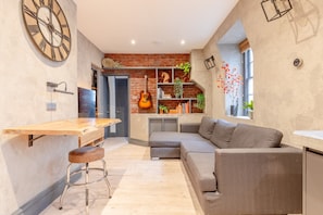 Apartamento Básico | Sala de estar | Televisor 