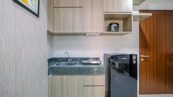 Apartamento | Cozinha privada | Um frigorífico/congelador grande, uma placa de cozinha