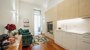 Apartamento Premium, vista para o jardim | Sala de estar
