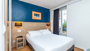 Quartos à prova de som, Wi-Fi de cortesia, roupa de cama