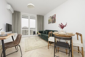 Apartamento, 1 quarto, sacada | Sala de estar