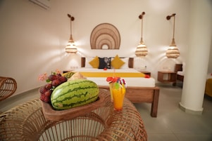 Quarto Triplo Deluxe, vista para o jardim