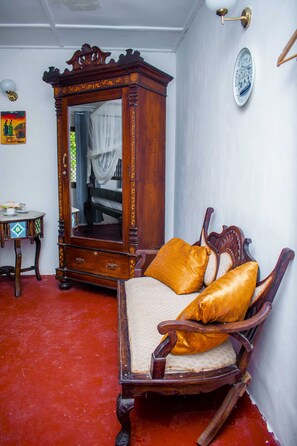 Quarto Triplo Deluxe | Sala de estar
