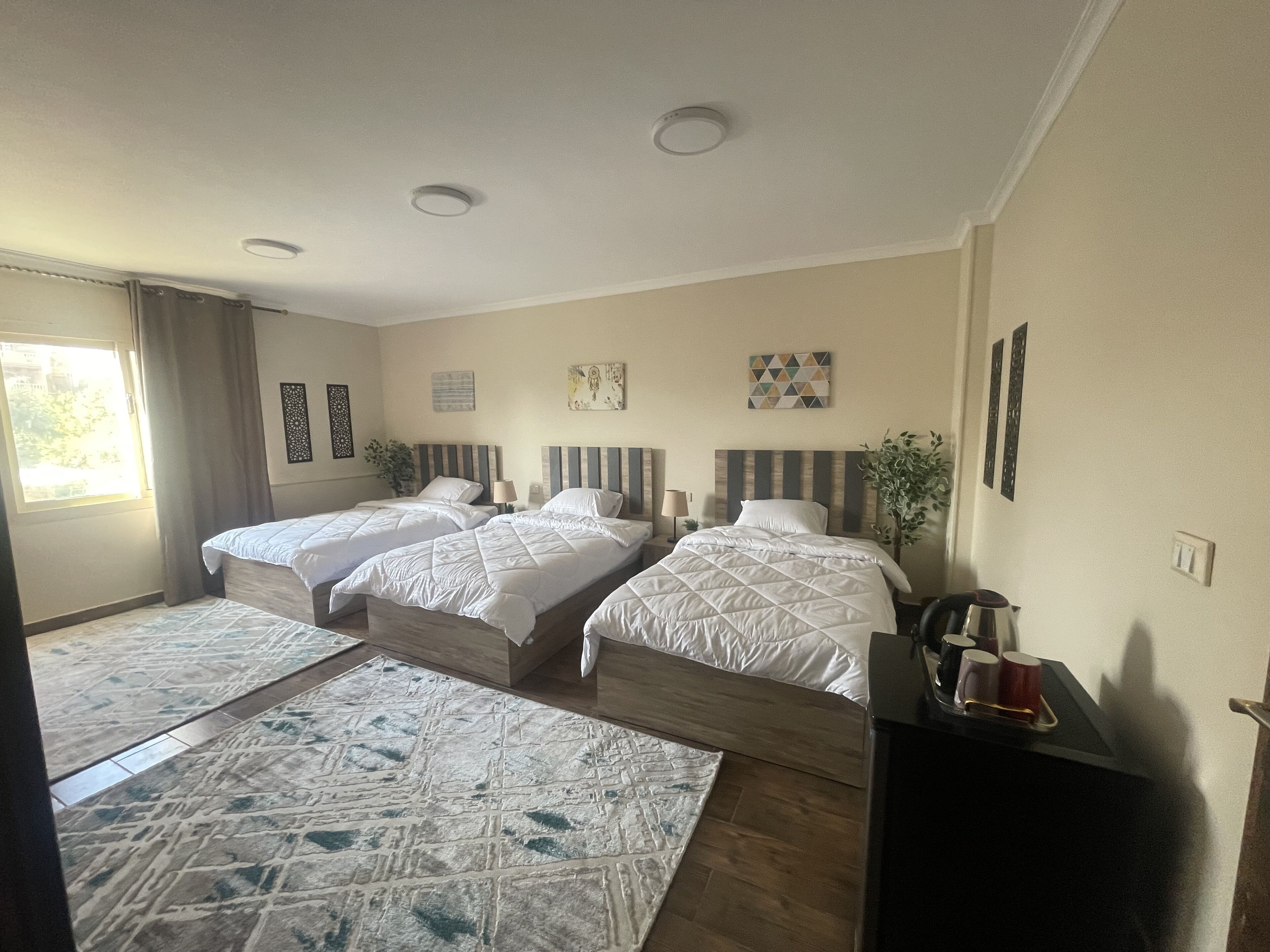 Quarto Triplo Deluxe | Quartos insonorizados, Wi-fi grátis 