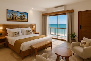 Quarto Deluxe, vista para o oceano, junto ao mar (King or Twin Bed) | Cofre no quarto, secretária, roupa de cama fornecida 