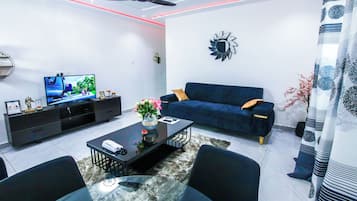 Apartamento Deluxe | Sala de estar
