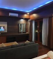 Quarto família | Frigobar, escrivaninha, quartos à prova de som, Wi-Fi de cortesia