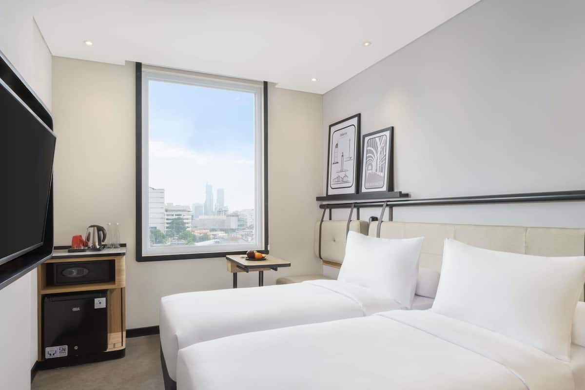 Quarto standard, 2 camas de solteiro | Cofres nos quartos, escrivaninha, quartos à prova de som