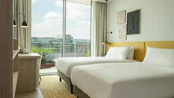 Roupas de cama premium, edredons de pluma, frigobar, cofres nos quartos