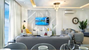 Apartamento Deluxe, 2 quartos | Sala de estar