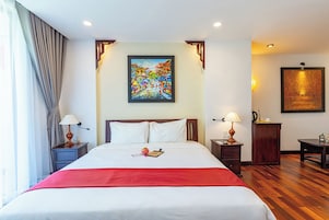 Suite Familiar | Minibar, cofre no quarto, secretária, Wi-fi grátis 