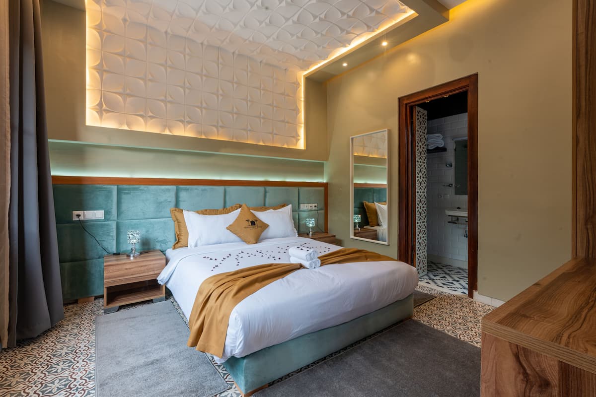 Suite Familiar, vista para a piscina | Cofre no quarto, ferro/tábua de engomar, Wi-fi grátis