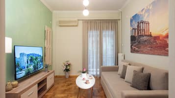 Apartamento Comfort | Sala de estar | Smart TV
