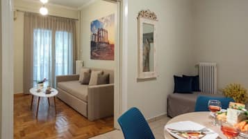 Apartamento Comfort | Sala de estar | Smart TV