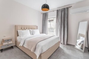 Apartamento urbano | 2 quartos, ferros/tábuas de passar roupa, Wi-Fi de cortesia