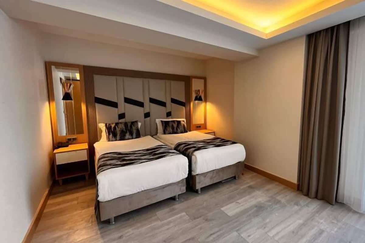 Minibar, quartos insonorizados, Wi-fi grátis, roupa de cama fornecida