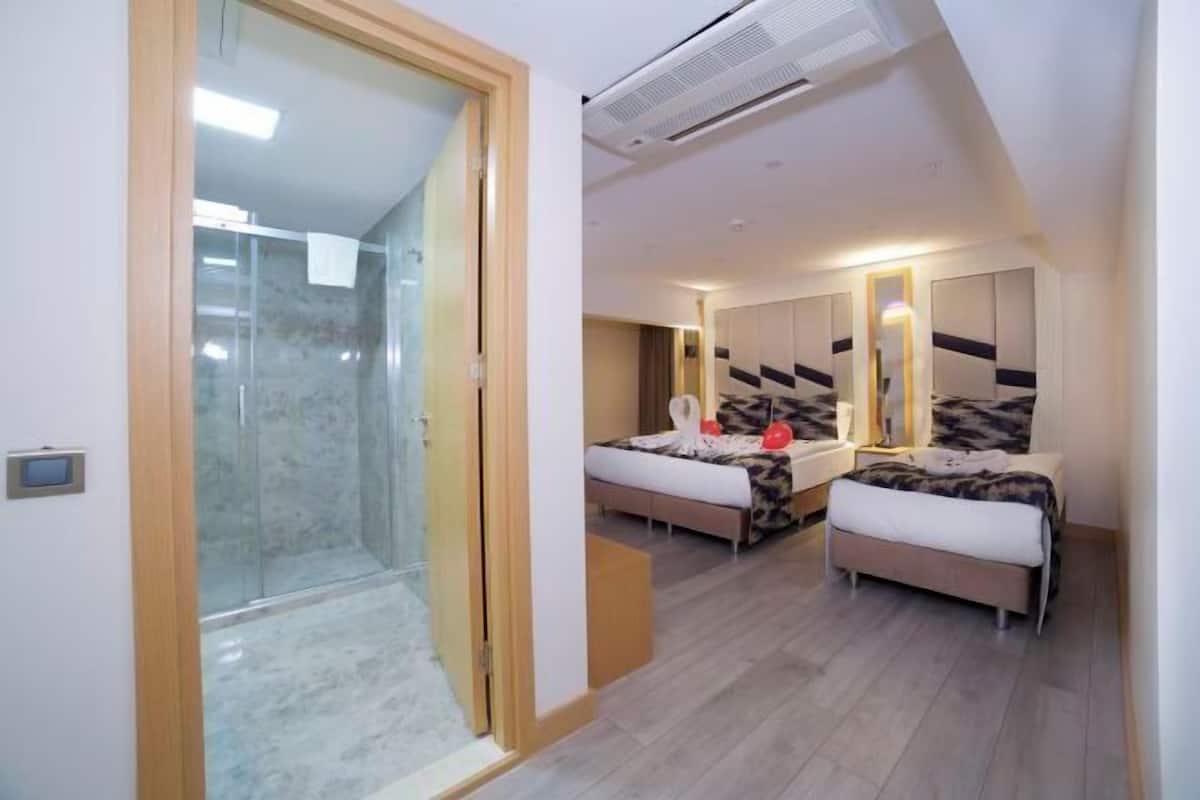 Minibar, quartos insonorizados, Wi-fi grátis, roupa de cama fornecida