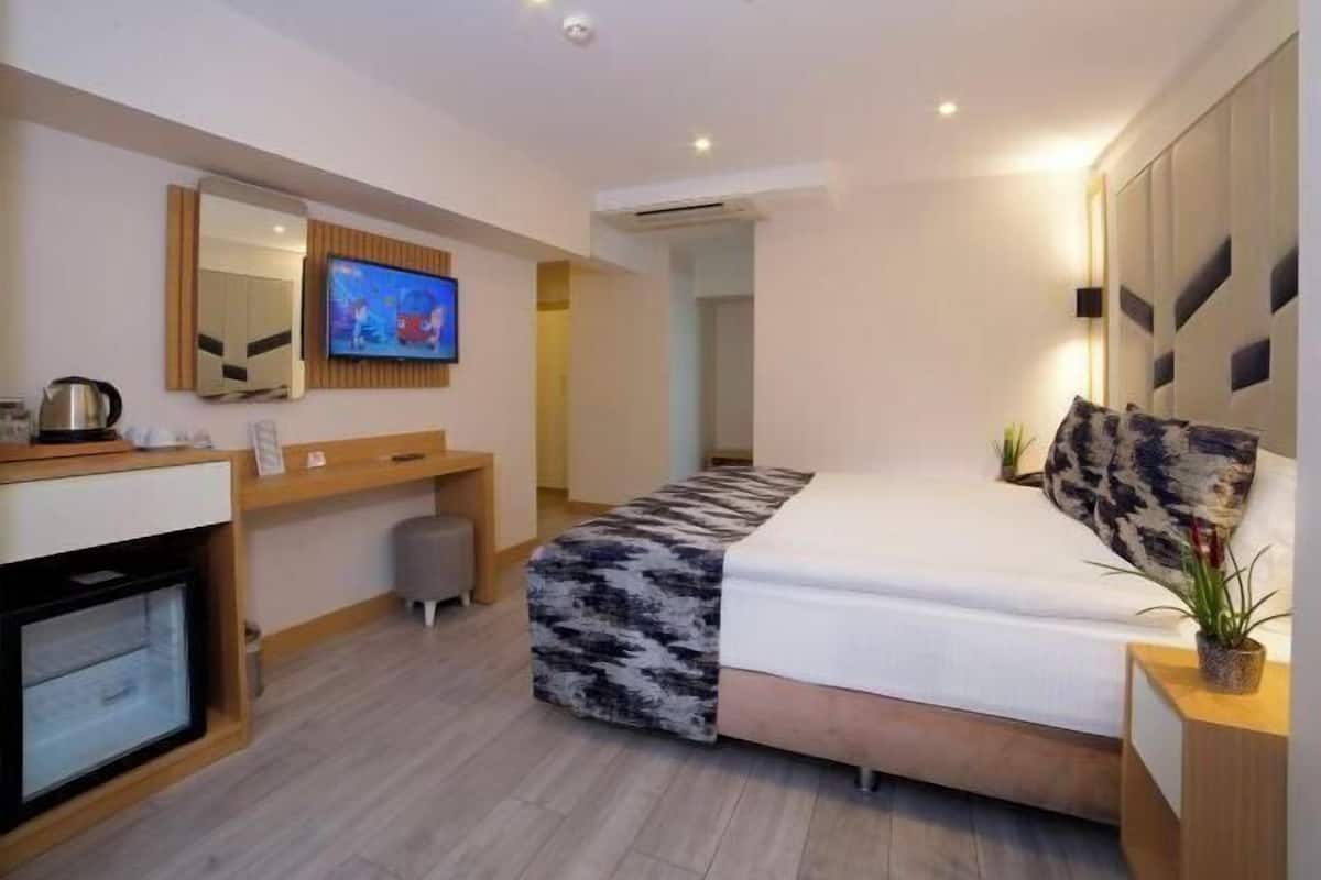 Minibar, quartos insonorizados, Wi-fi grátis, roupa de cama fornecida