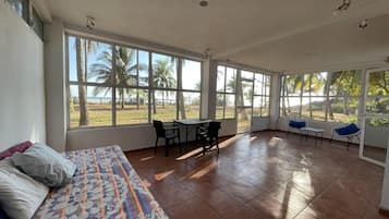 Quarto triplo luxo | Área de estar