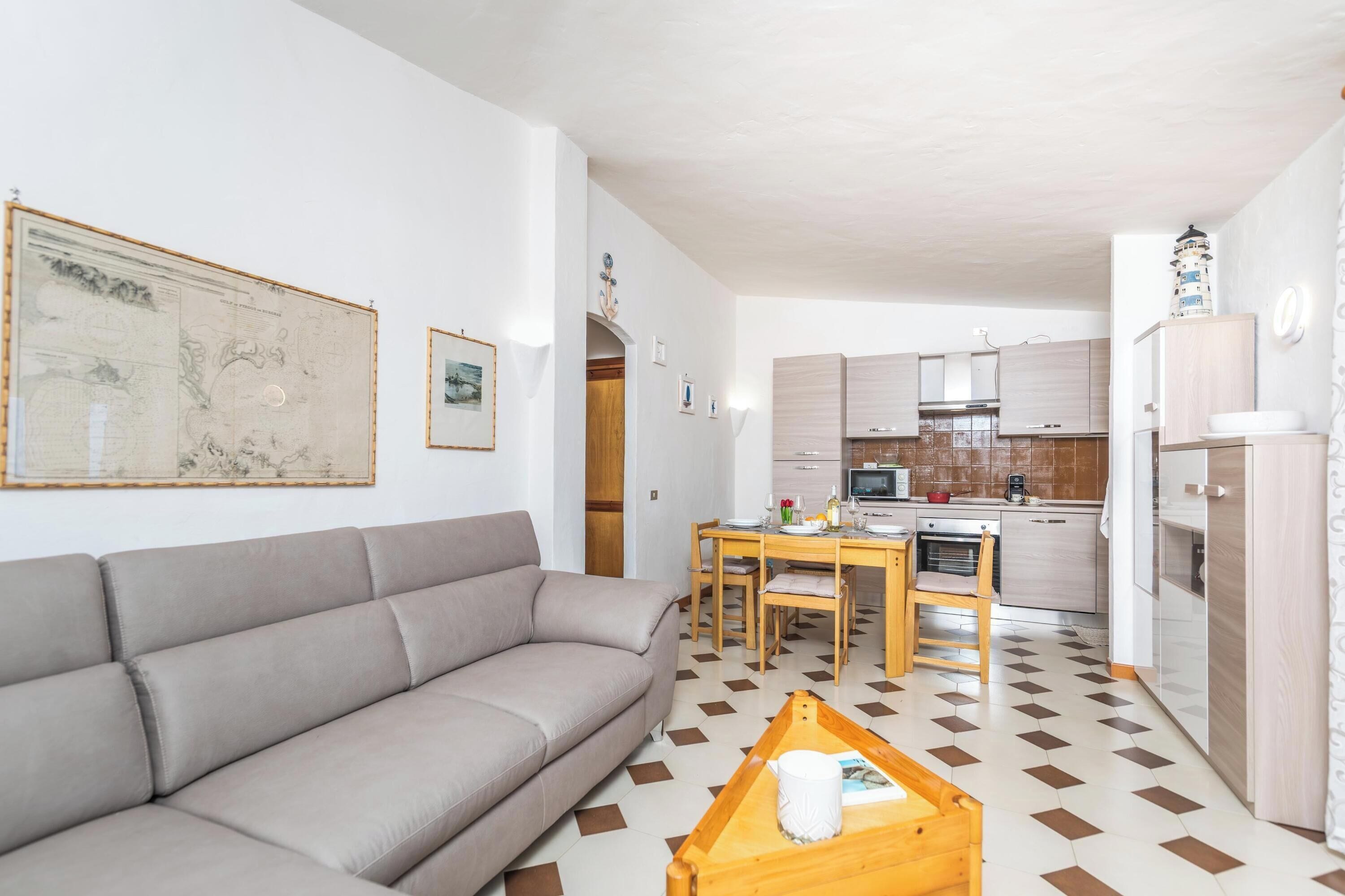 Apartamento família, vários quartos (La Lampara House) | Área de estar | TV de tela plana 21 polegadas com canais a cabo