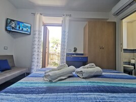 Quarto luxo | Escrivaninha, cortinas blackout, Wi-Fi de cortesia