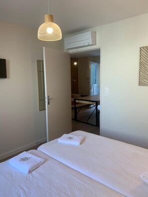 Apartamento | Quartos à prova de som, Wi-Fi de cortesia, roupa de cama