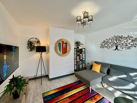 Casa família | Área de estar | TV de tela plana, console de videogame