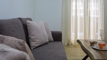 Apartamento Cidade | Sala de estar | TV de ecrã plano