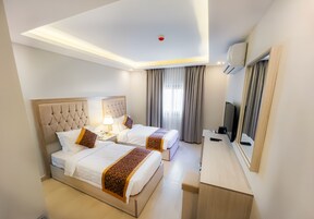 Quarto duplo luxo | Roupas de cama premium, frigobar (abastecido com alguns itens grátis)