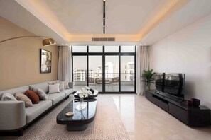 Apartamento exclusivo | Área de estar | Smart TV 55 polegadas com canais via satélite