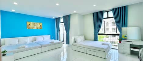 Quarto família | Frigobar, escrivaninha, quartos à prova de som, Wi-Fi de cortesia