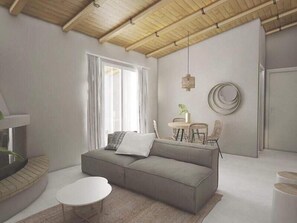 Apartamento Básico | Sala de estar | Televisor de ecrã plano de 30 polegadas com canais por cabo