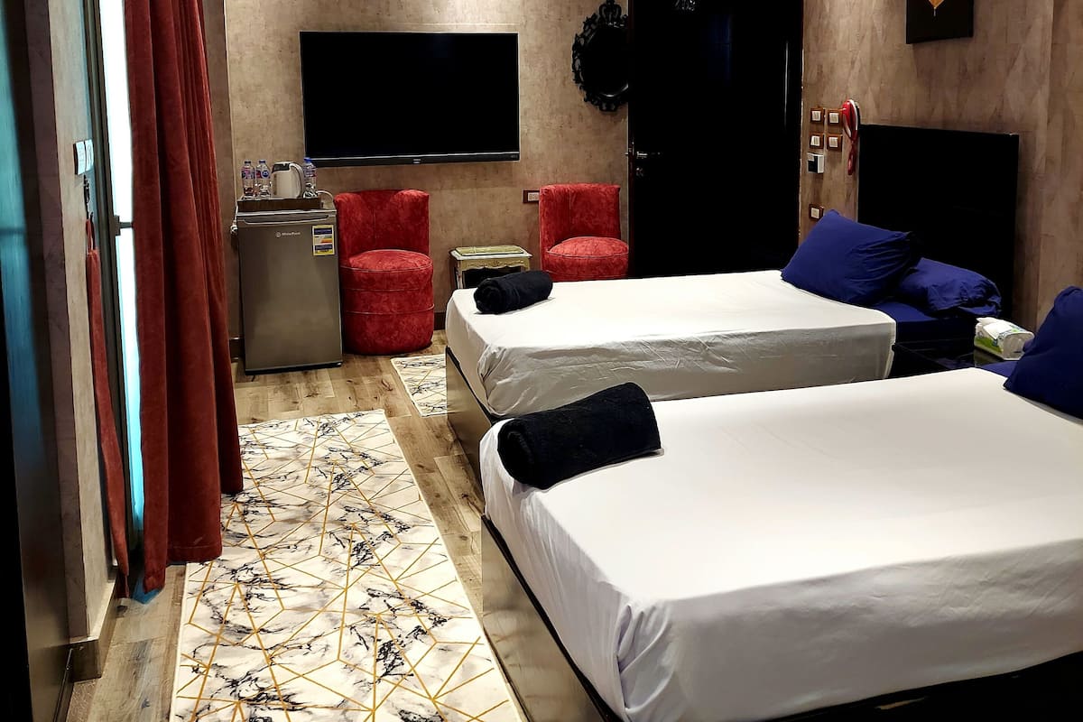 1 quarto, edredões de penas, minibar, com decoração personalizada