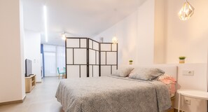 Quarto | Área de estar | TV