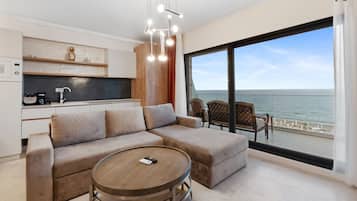 Apartamento panorâmico | Área de estar | TV de tela plana