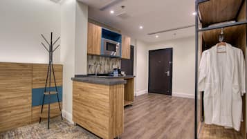 Suíte executiva, 1 cama King | Área de estar