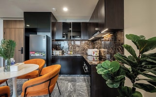 Apartamento Deluxe, 2 quartos, varanda, Vista para a cidade | Cozinha privada
