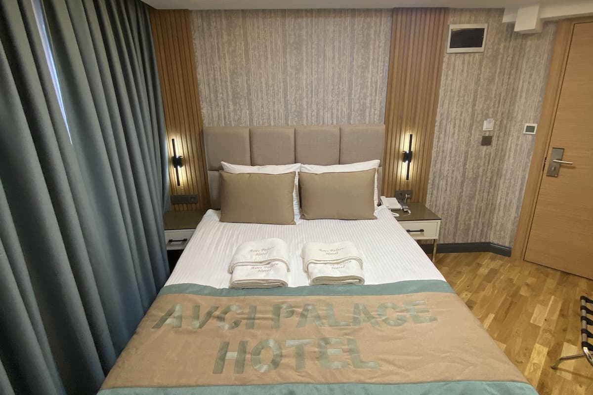 Quarto Deluxe, vista para o mar | Roupa de alta qualidade, edredões de penas 