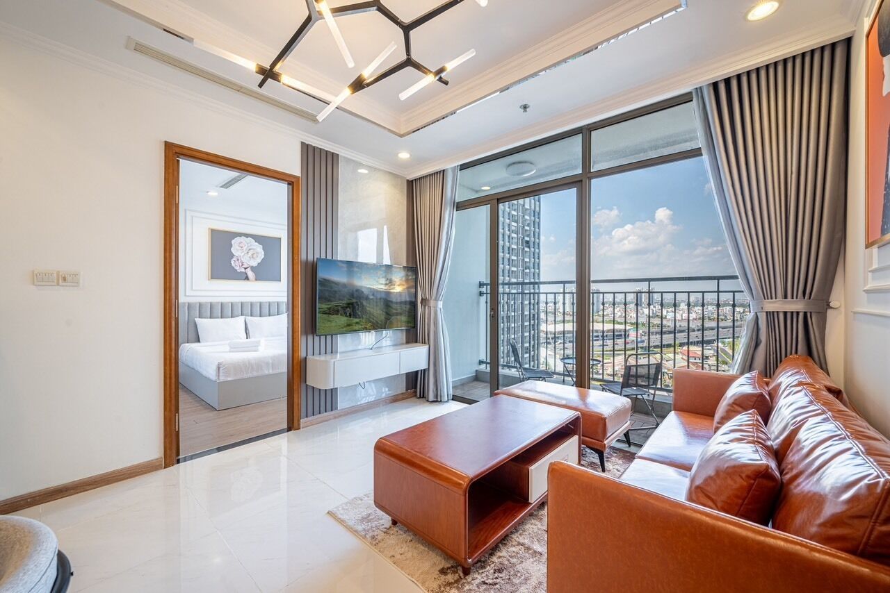 Apartamento Panorâmico, 3 quartos, varanda, Vista para a cidade | Sala de estar | Smart TV de 55 polegadas com canais via satélite 