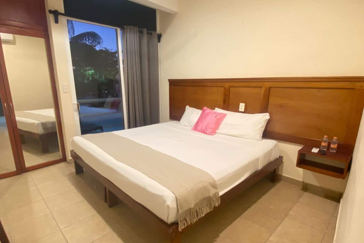 Quarto standard, vista para a cidade | Roupa de cama