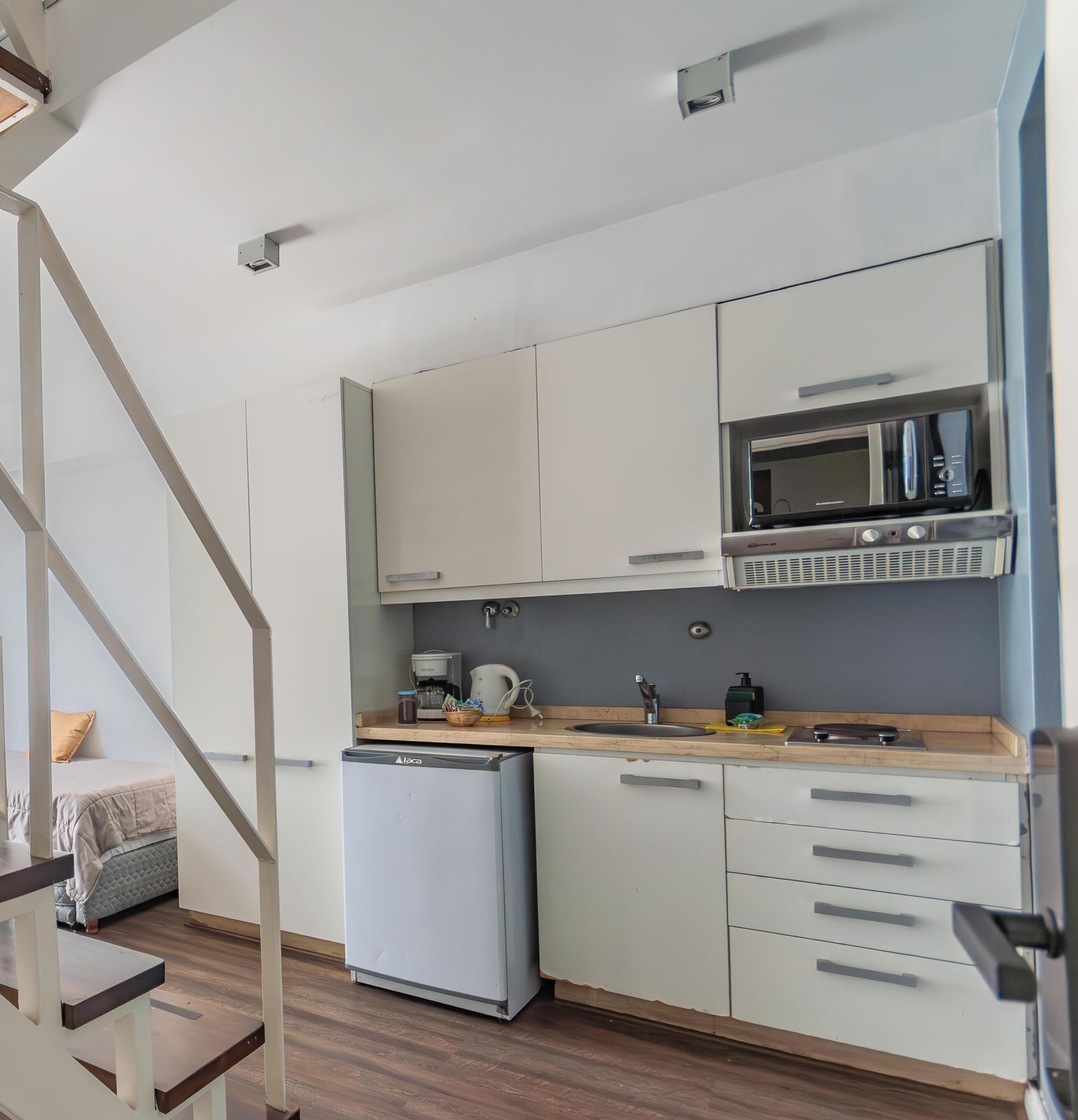 Duplex | Cozinha privada | Frigobar, torradeira, produtos de limpeza