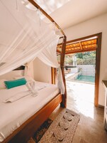 Suíte premium | 1 quarto, frigobar, ferros/tábuas de passar roupa, Wi-Fi de cortesia