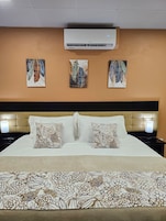 Suite Deluxe, não fumadores, vista para o mar | Roupa de alta qualidade, edredões de penas, camas de colchão pillowtop